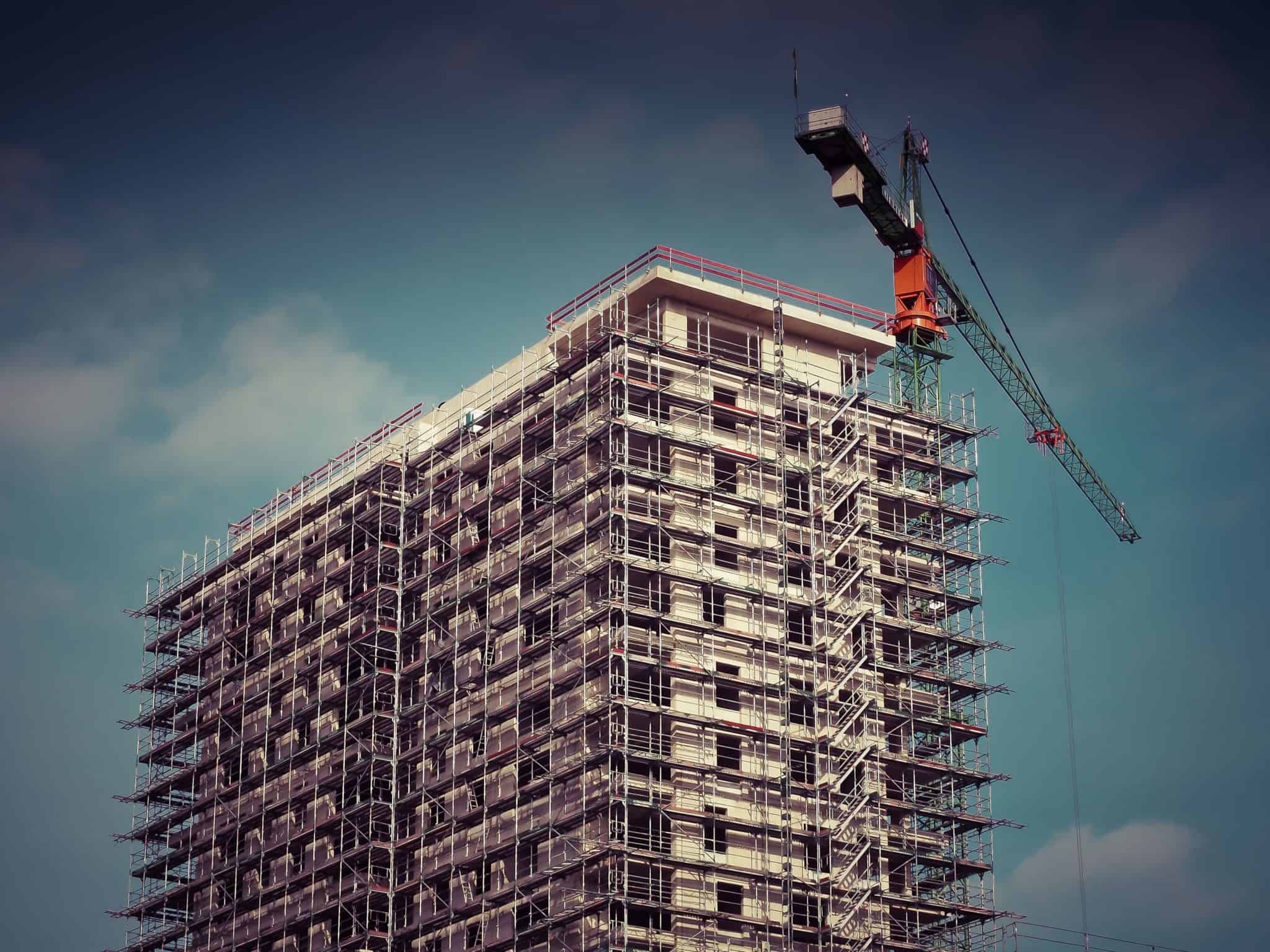 Crane Overtop Of Building With Scaffold - Construction Files